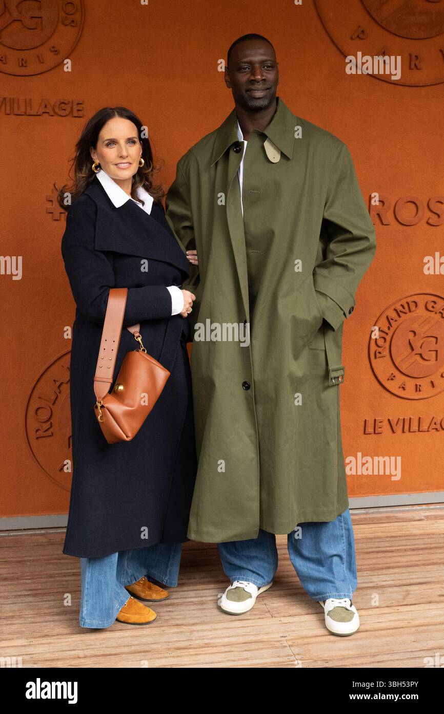 Paris, France. 7th June, 2025. Helene Sy and Omar Sy take a pose at ...