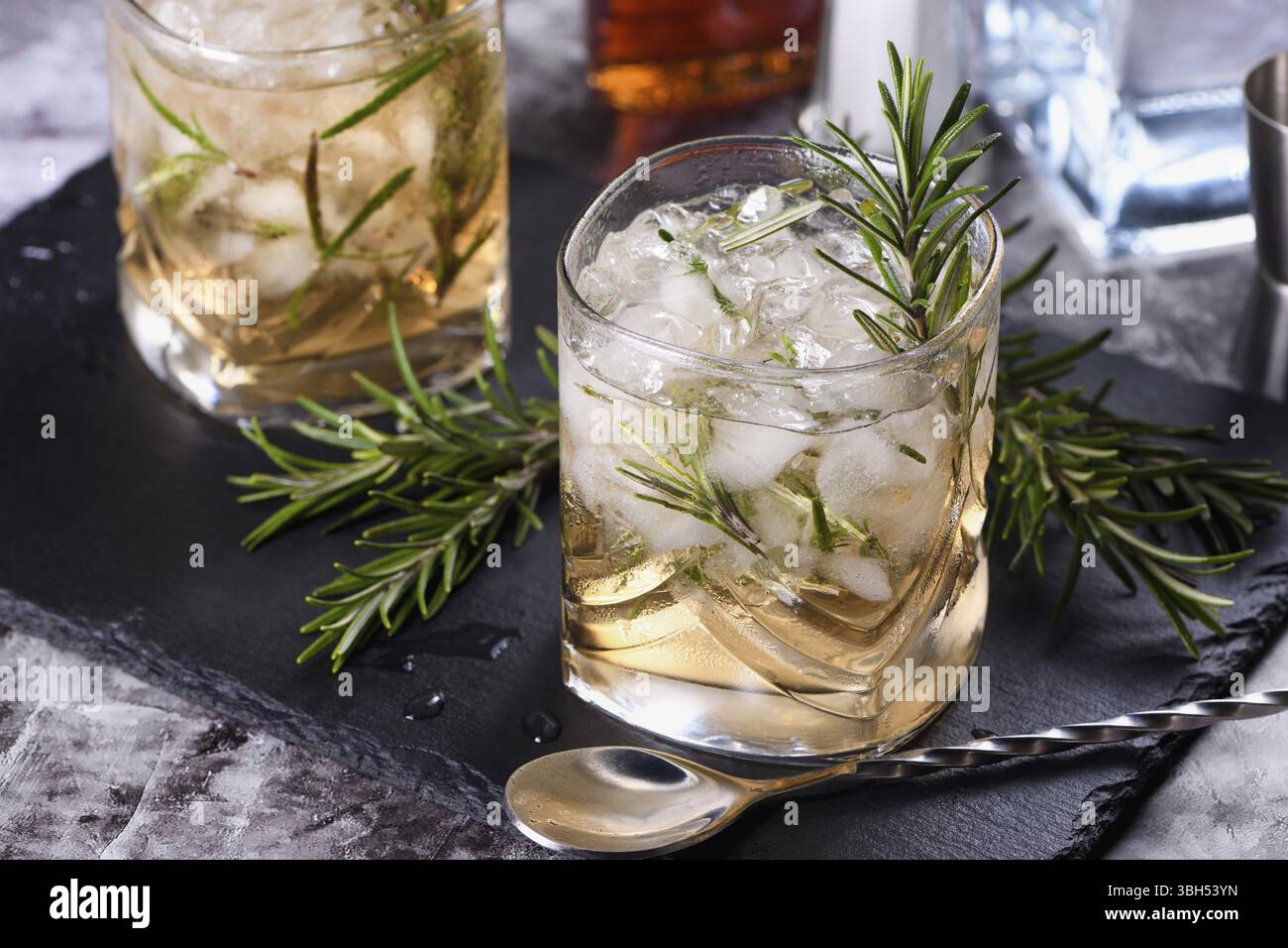 The Rosemary Vodka cocktail consists of maple syrup with a small amount ...
