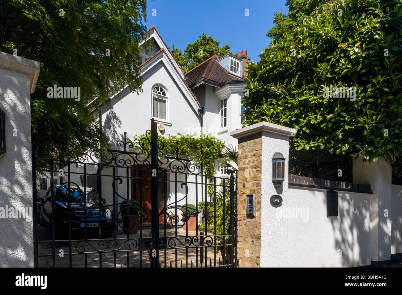 London, UK, 5 May 2025, A stately white house with architectural ...