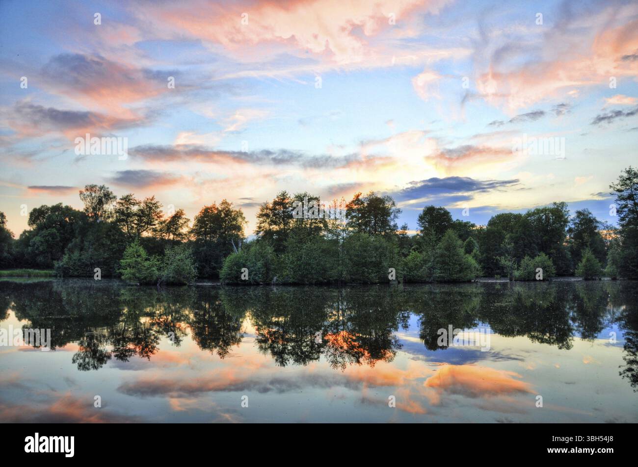 Sunset above Fulda river in Aueweiher Park in Fulda, Hessen, Germany ...