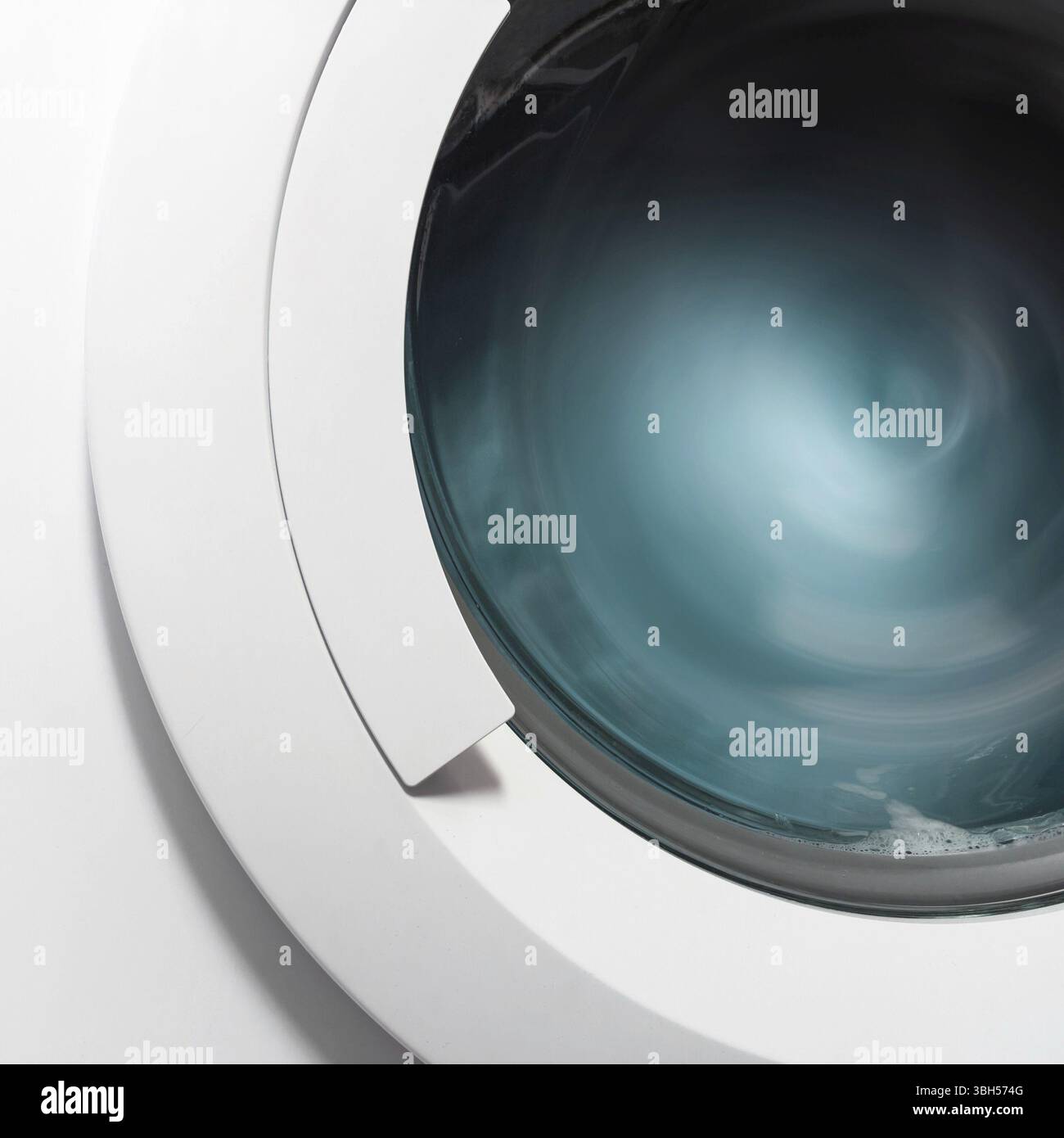 Washing machine drum in operation (centrifugal Stock Photo - Alamy