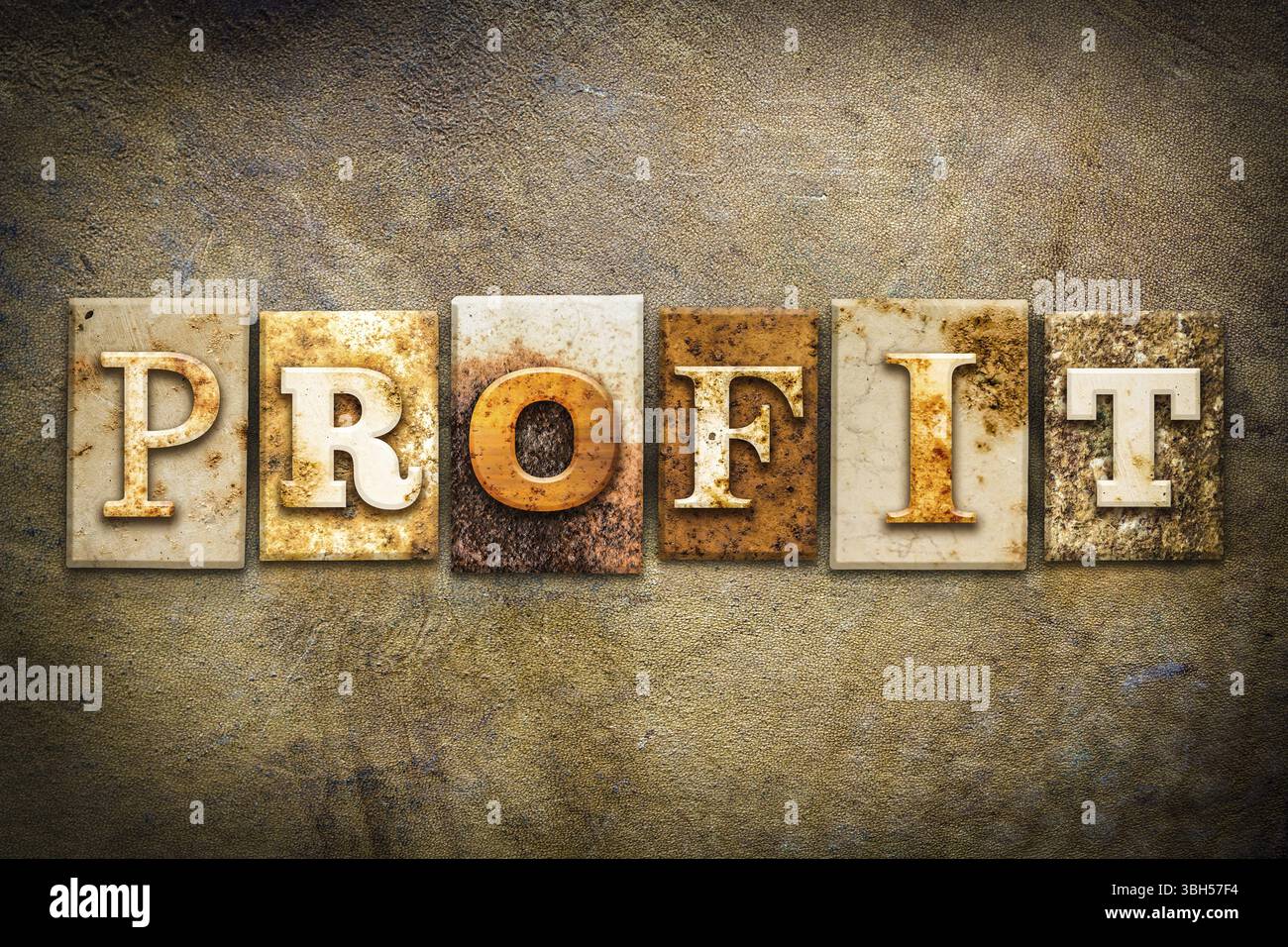 The word PROFIT written in rusty metal letterpress type on an old aged ...