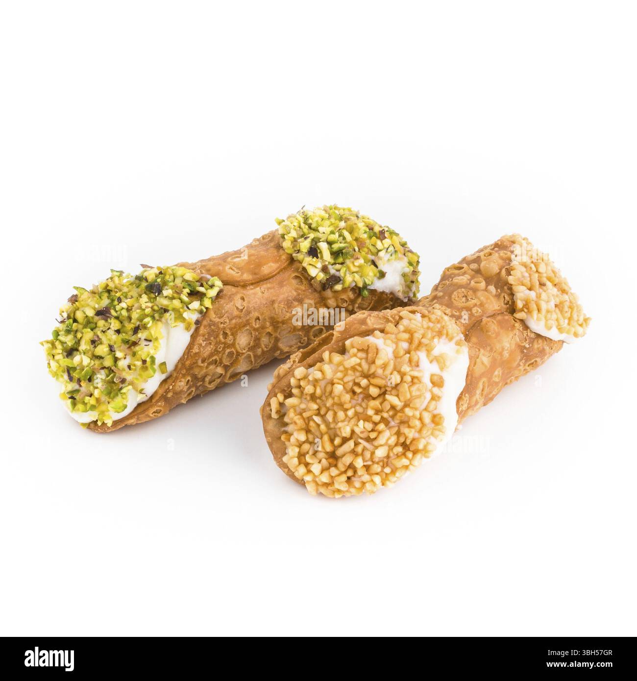 Two cannoli pastries. Traditional Sicilian dessert, filled with a rich ...