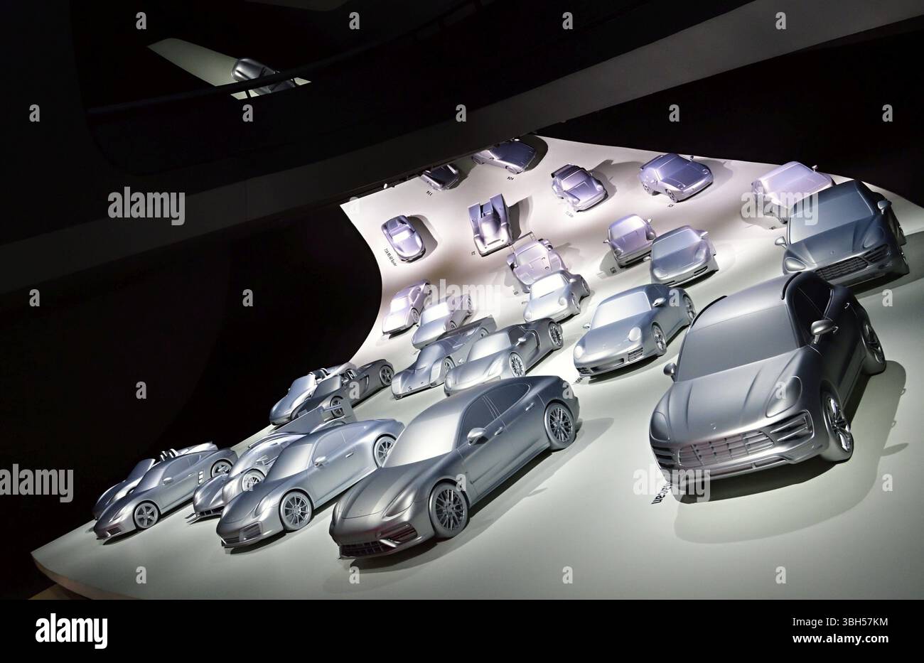 Silver Porsche models set up in a curve. Models from yesterday and ...