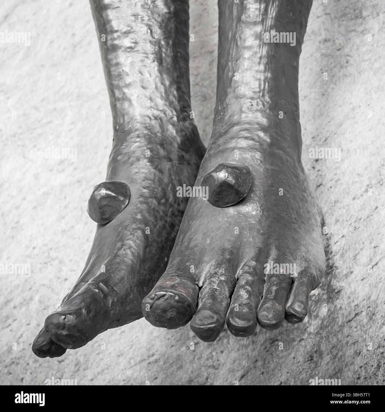 Nailed feet, detail of statue of Jesus Christ crucified Stock Photo - Alamy