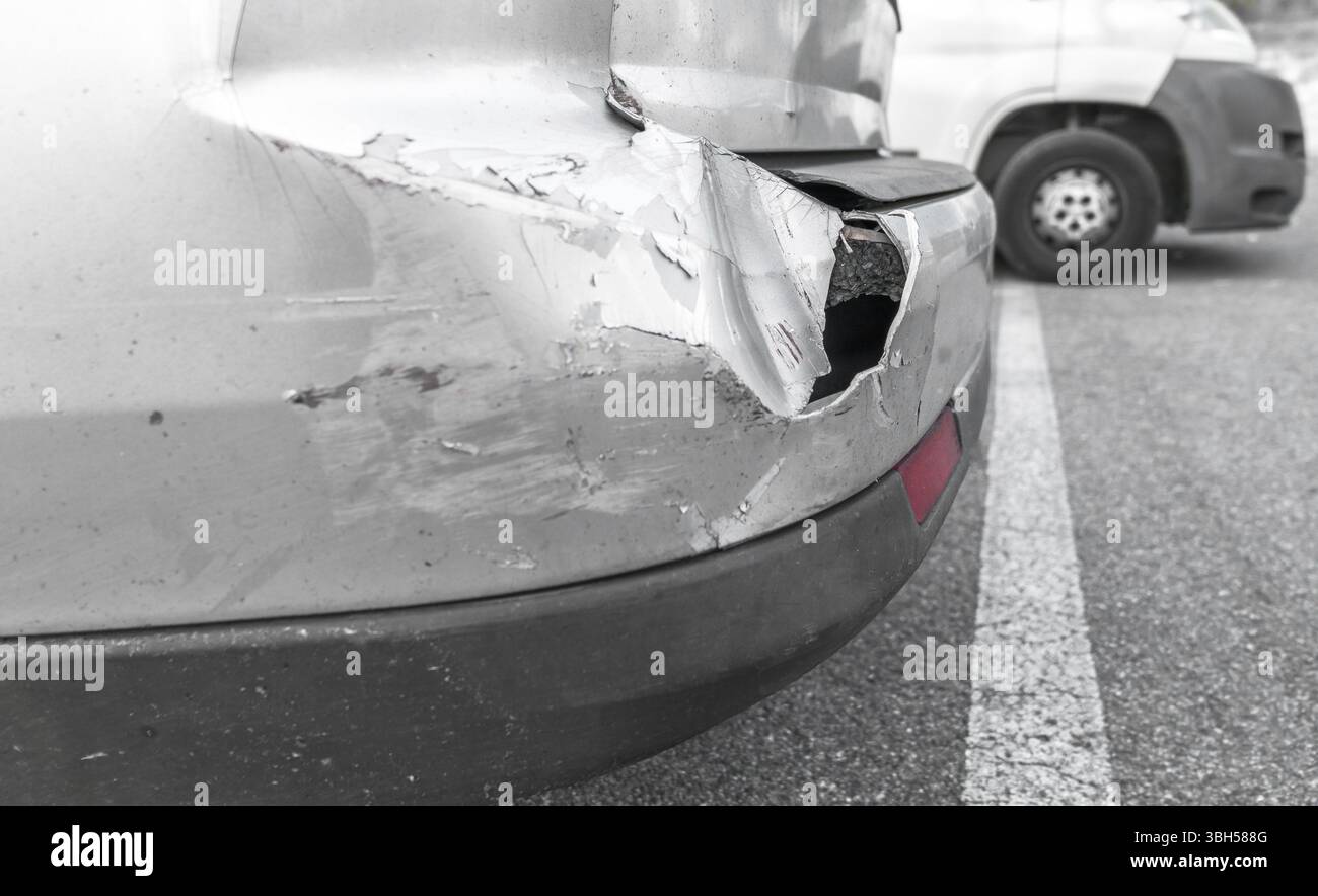 Back of gray car get damaged from accident on the road. Vehicle bumper ...