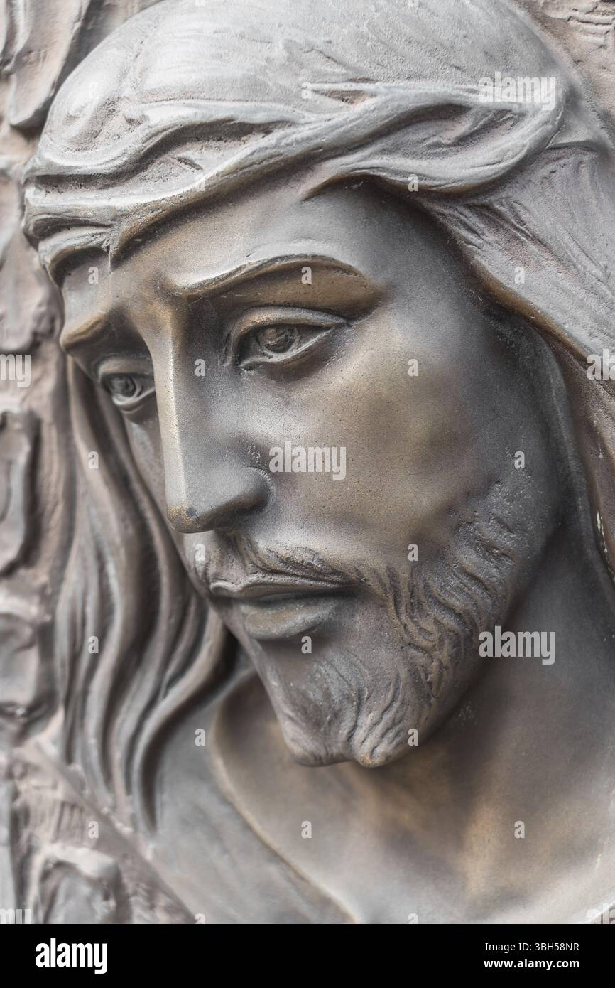 Bronze statue of the face of jesus with a crown of thorns. Ancient ...