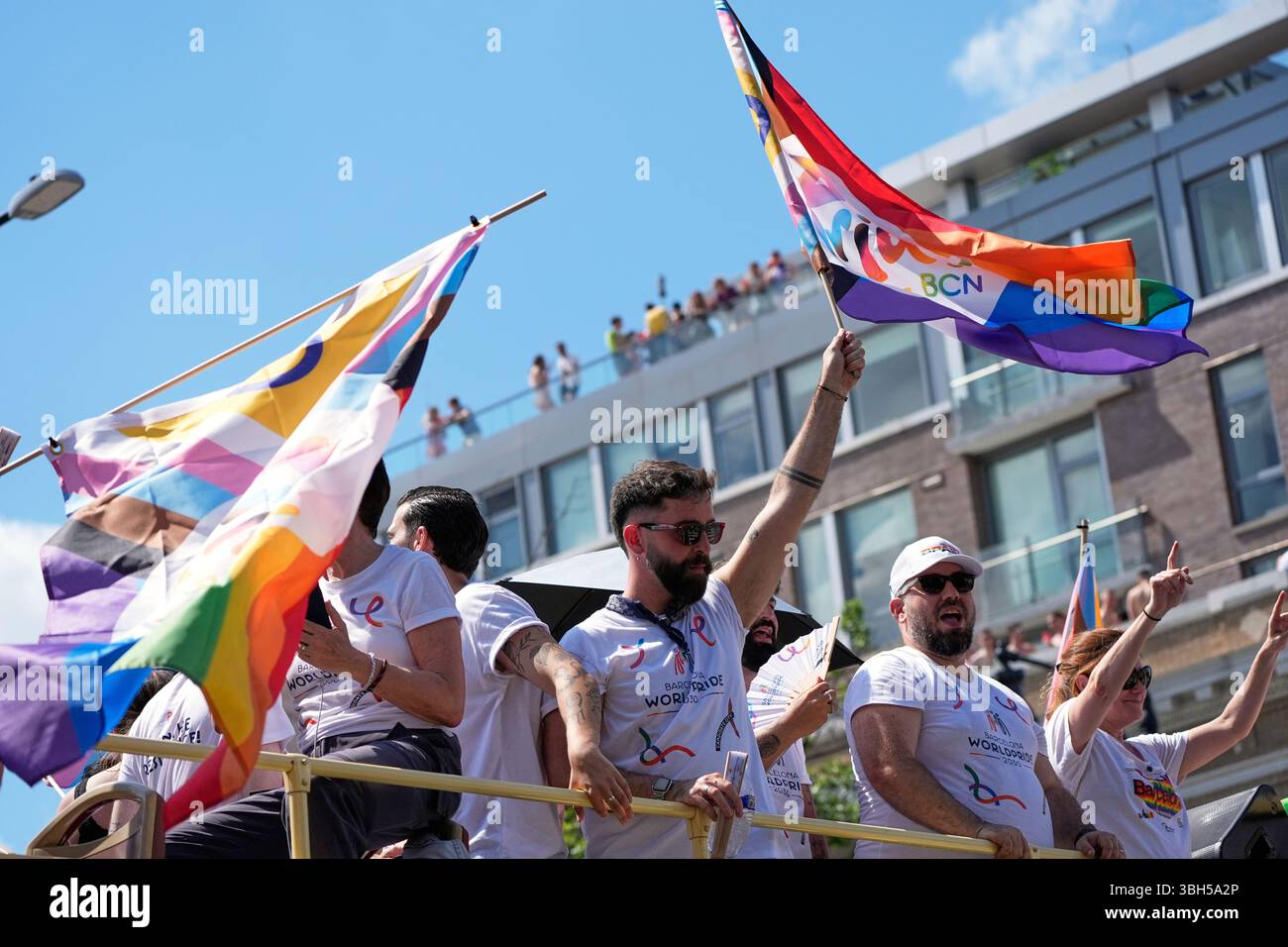 People ride a vehicle during the World Pride parade, Saturday, June 7 ...