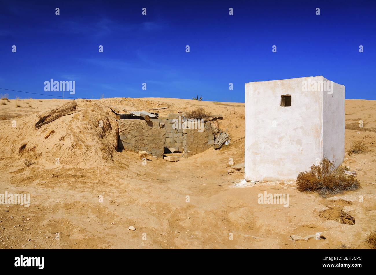 White building in Sahara desert in Tunisia, North Africa Stock Photo ...