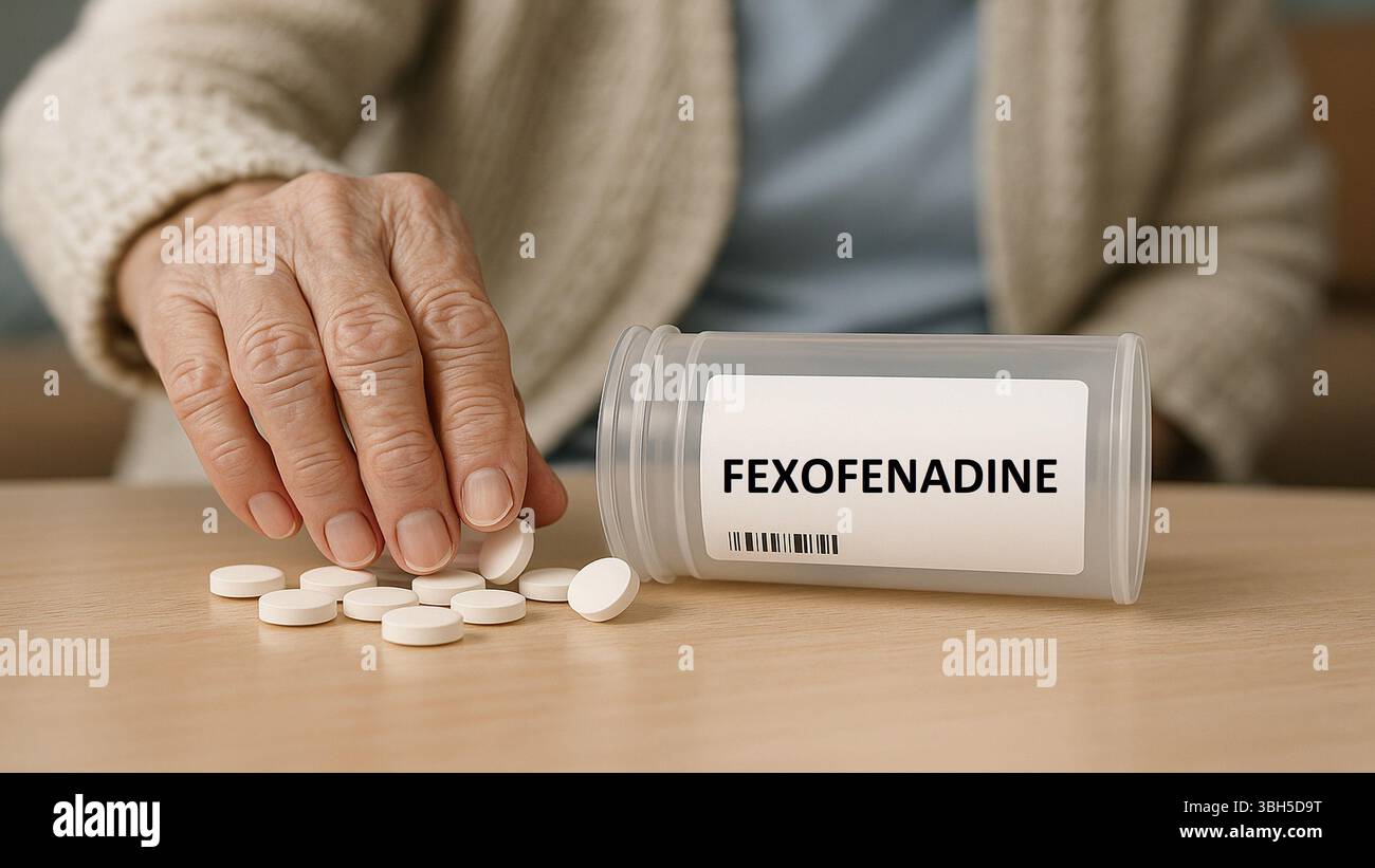 Fexofenadine plastic box of medication with tablets on a table Stock ...