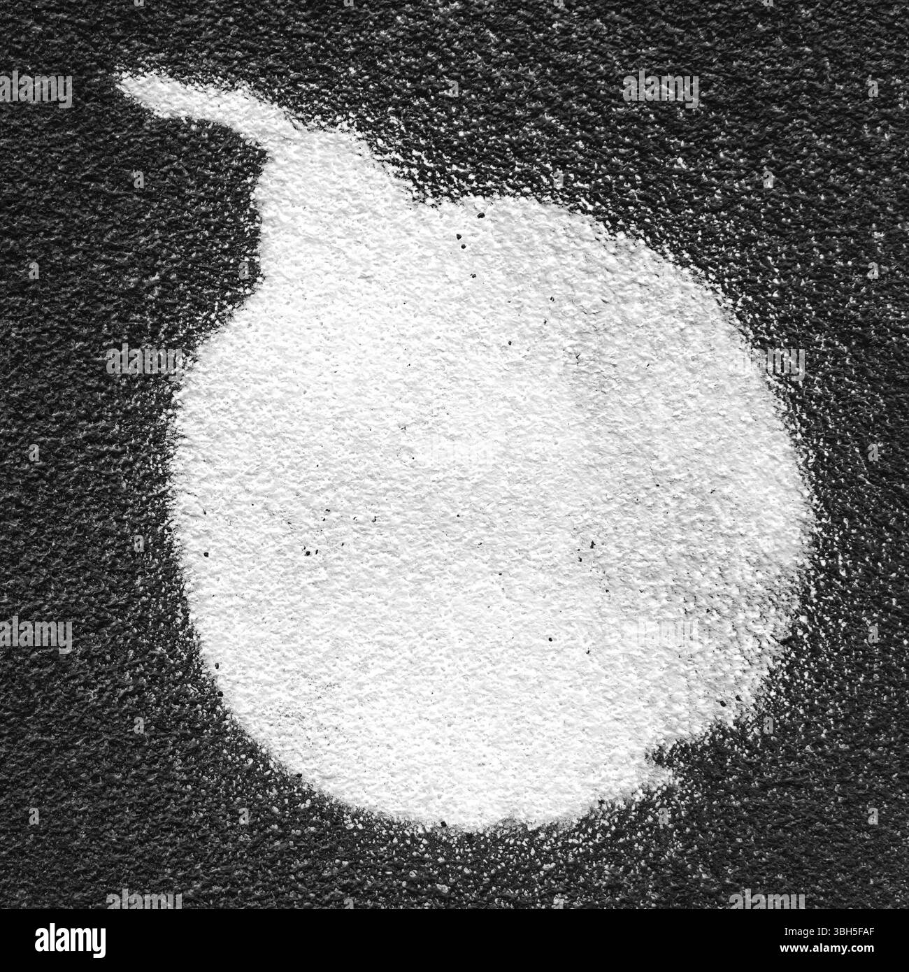 Bomb painted with white paint spray on a black wall Stock Photo - Alamy