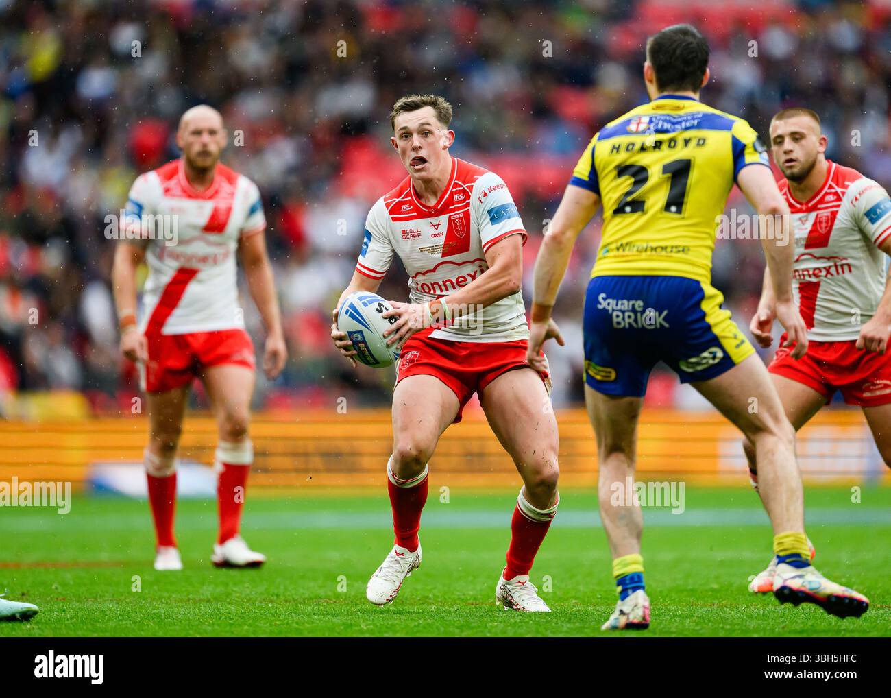 LONDON, UNITED KINGDOM. June 07: Jack Broadbent of Hull KR (centre) in ...