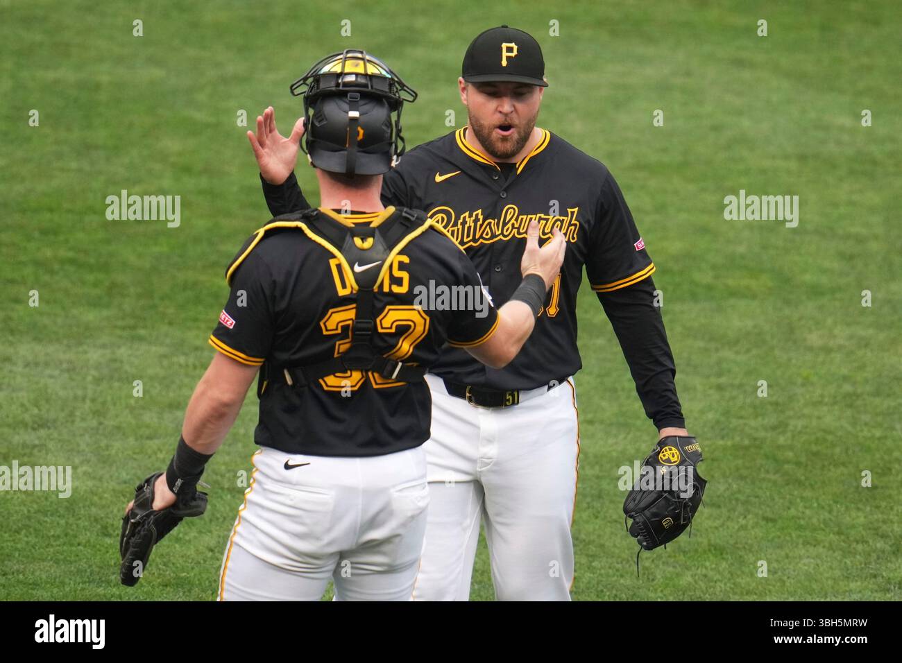 Pittsburgh Pirates pitcher David Bednar, right, celebrates with catcher ...