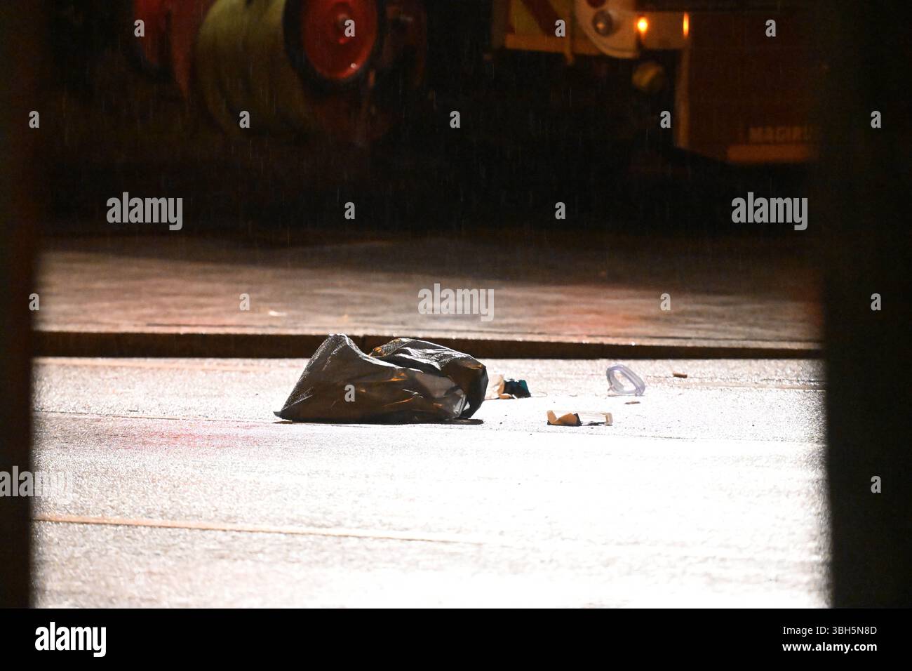 07 June 2025, Bavaria, Munich: Objects lying in the street. After knife ...