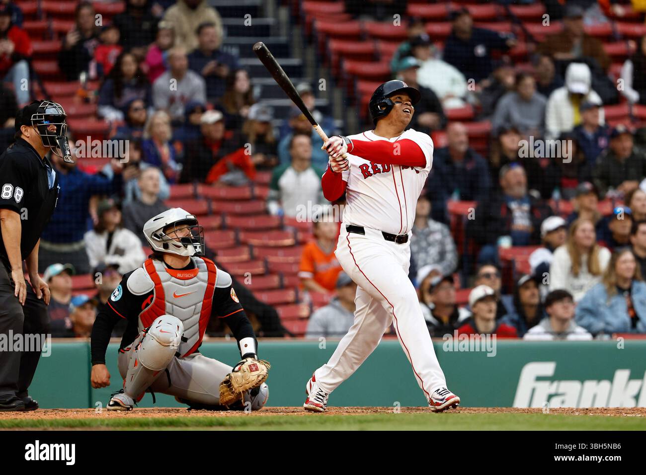 Boston Red Sox's Rafael Devers follows through on his grand slam home ...