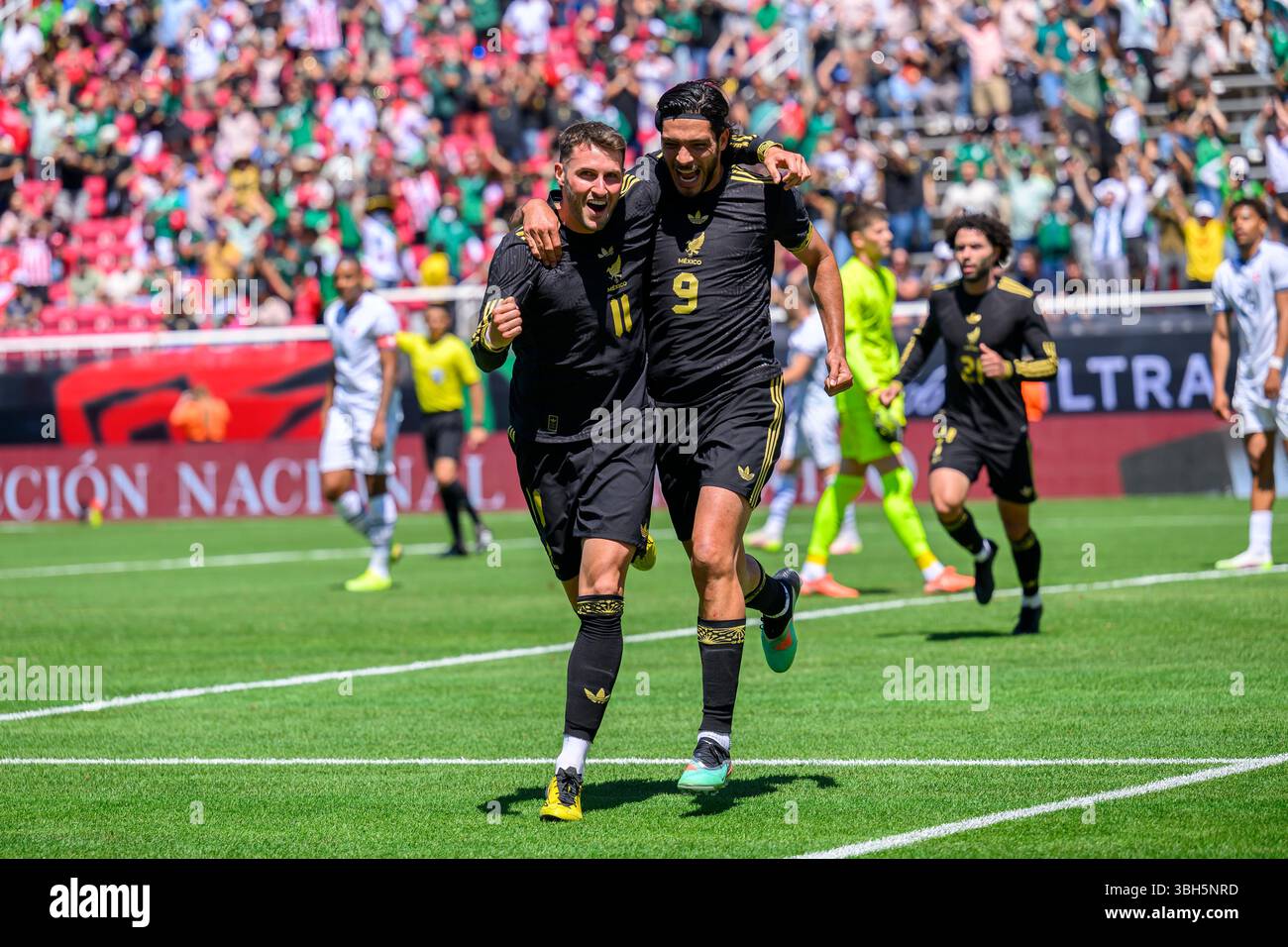 Mexico's Santiago Gimenez (11) and Raúl Jiménez (9) celebrate a goal ...