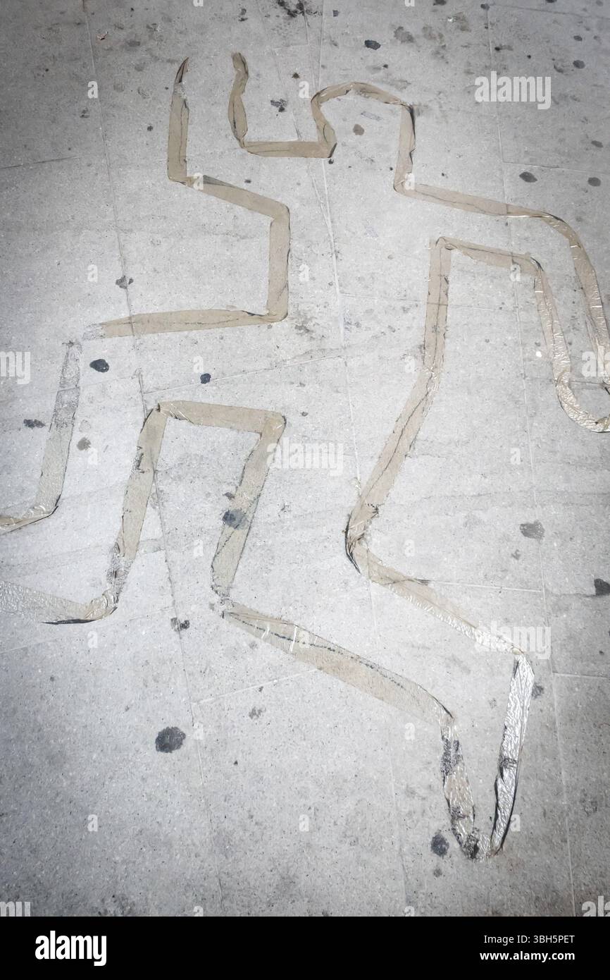Dead body silhouette on ground made with scotch tape. Crime scene ...