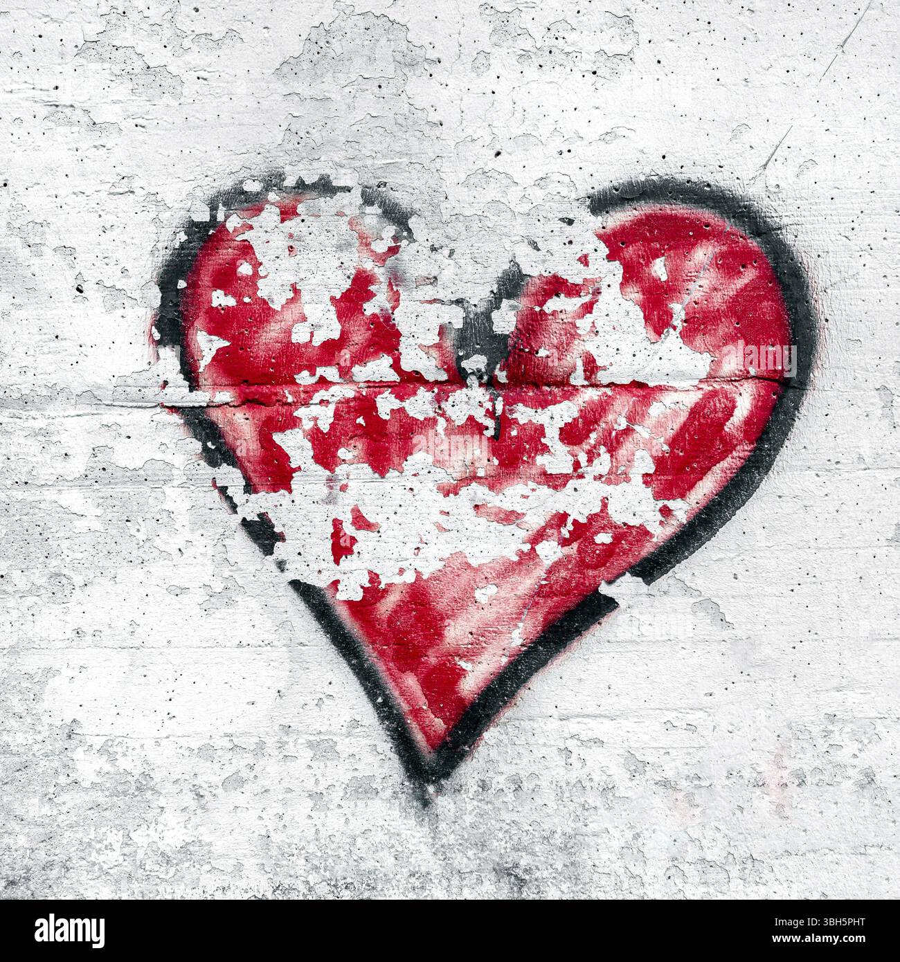 Red heart with black outline on cracked wall. Holidays and events ...