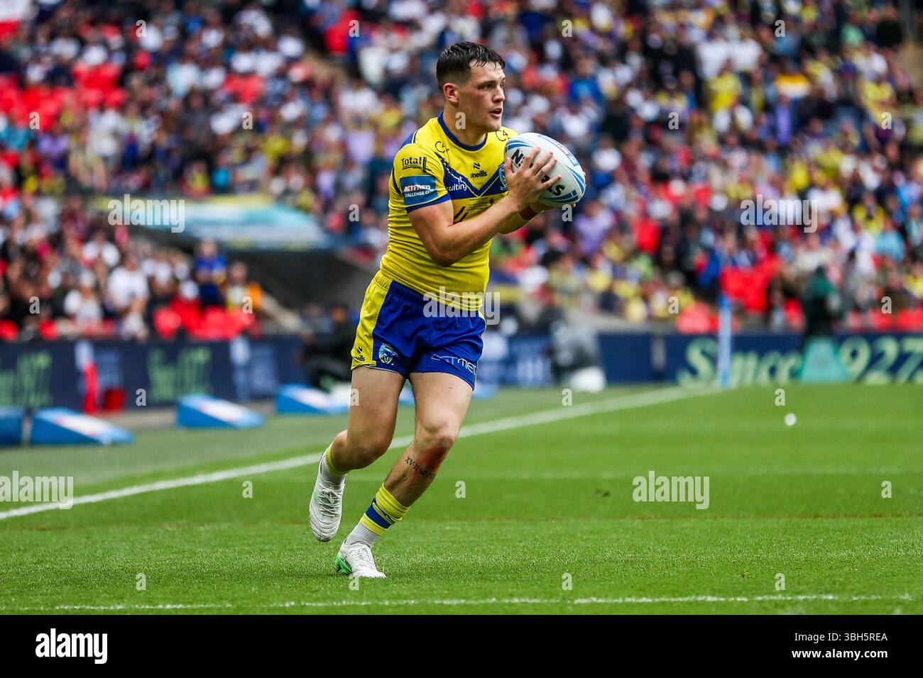 London, UK. 07th June, 2025. Josh Thewlis of Warrington Wolves runs ...
