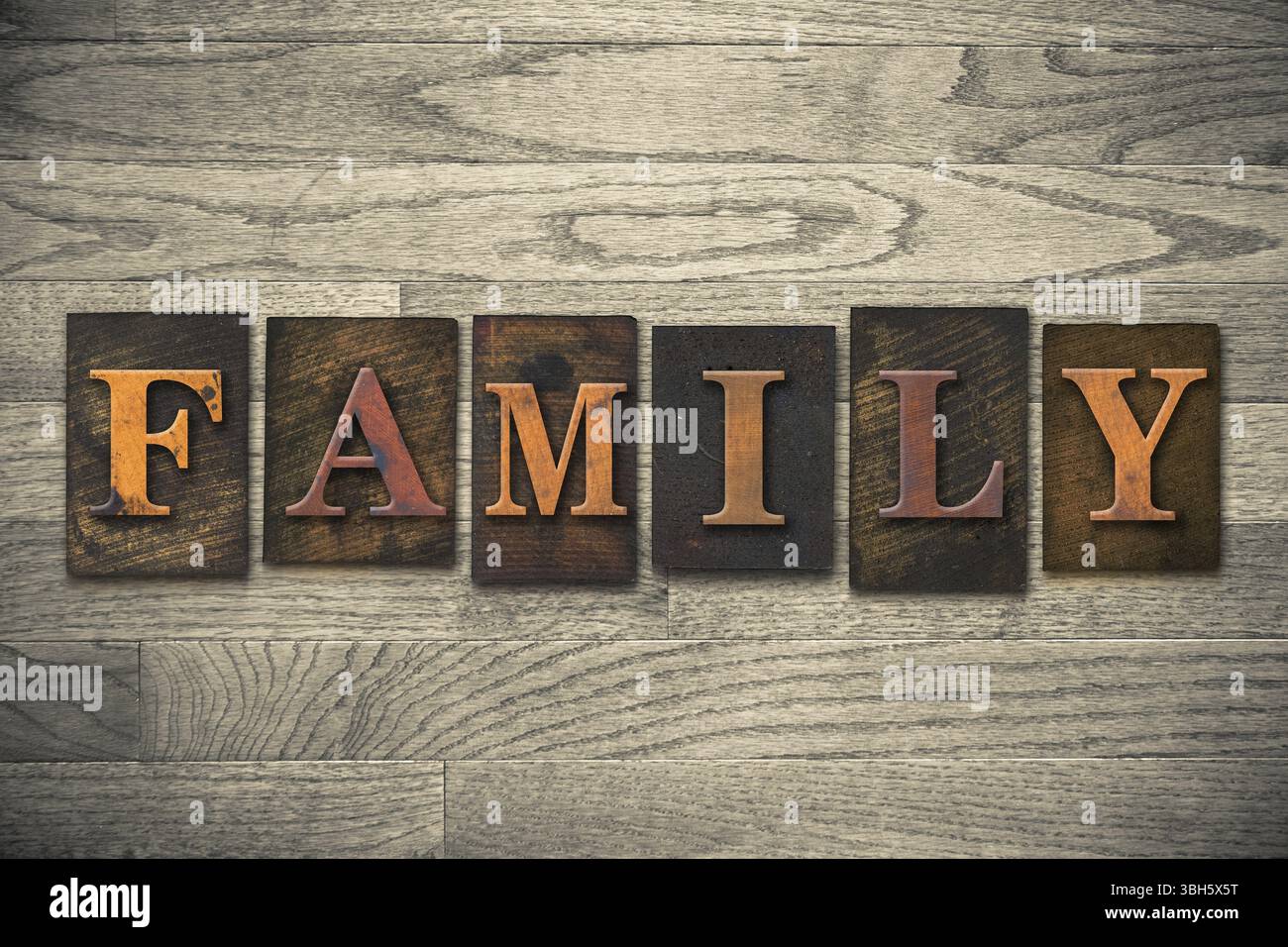 The word FAMILY written in wooden letterpress type Stock Photo - Alamy