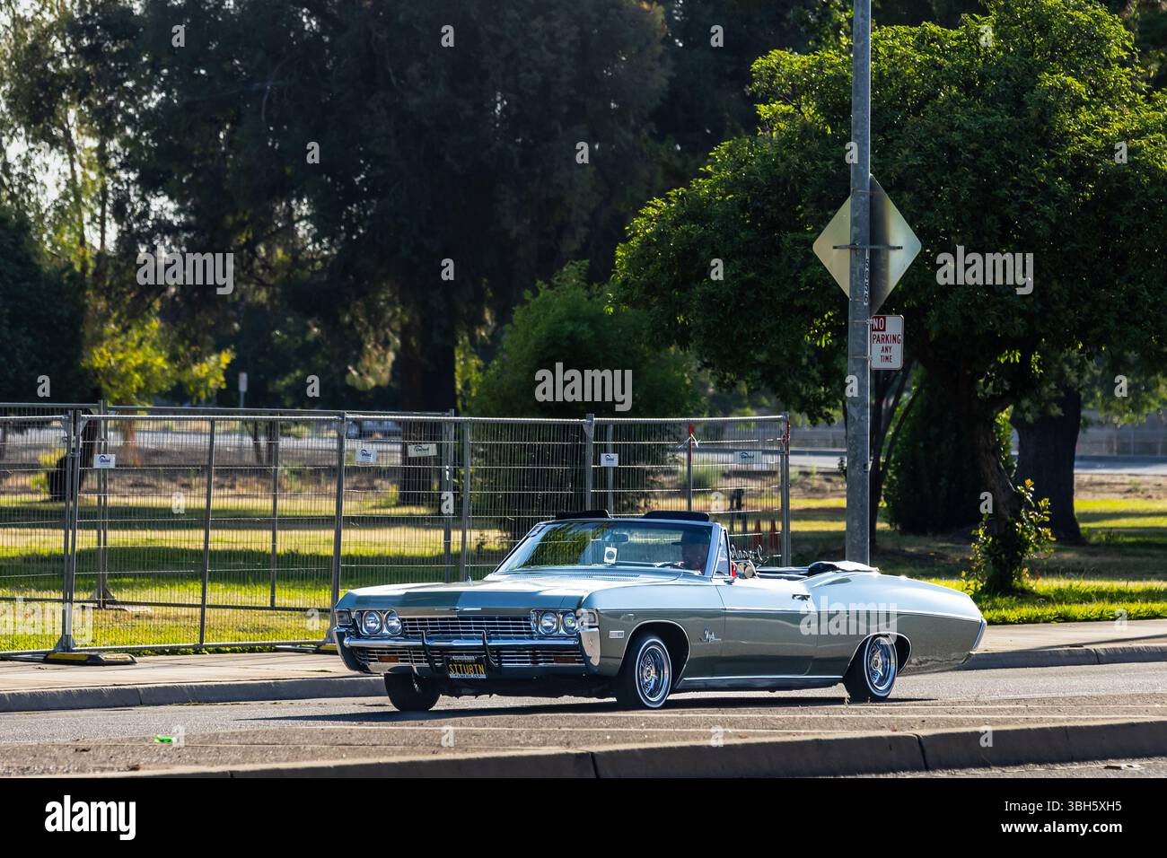 A 1967 Chevrolet Impala at the 2025 American Graffiti car show and ...