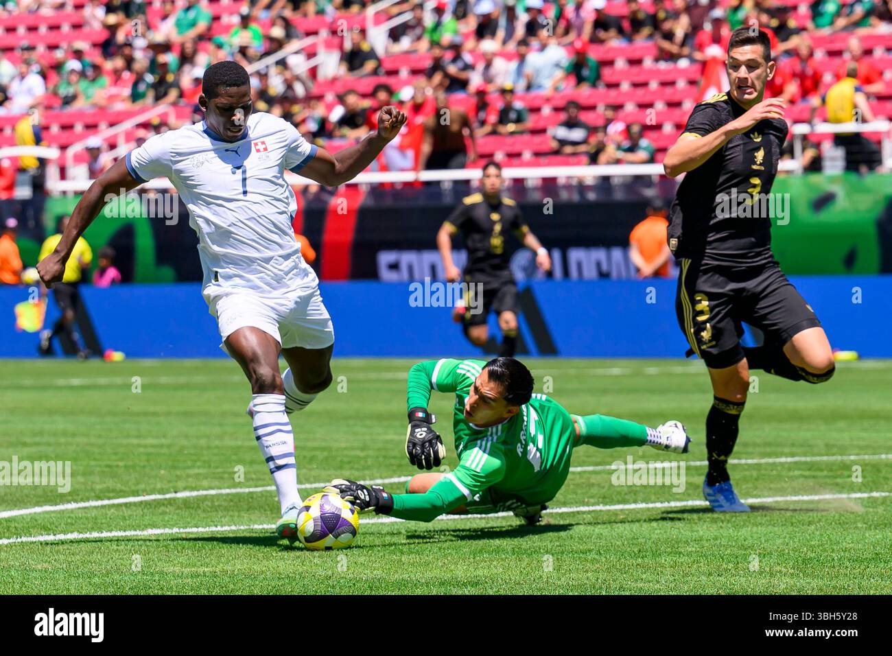 Mexico's José Raúl Rangel (12) dives to try and stop the dribble of ...