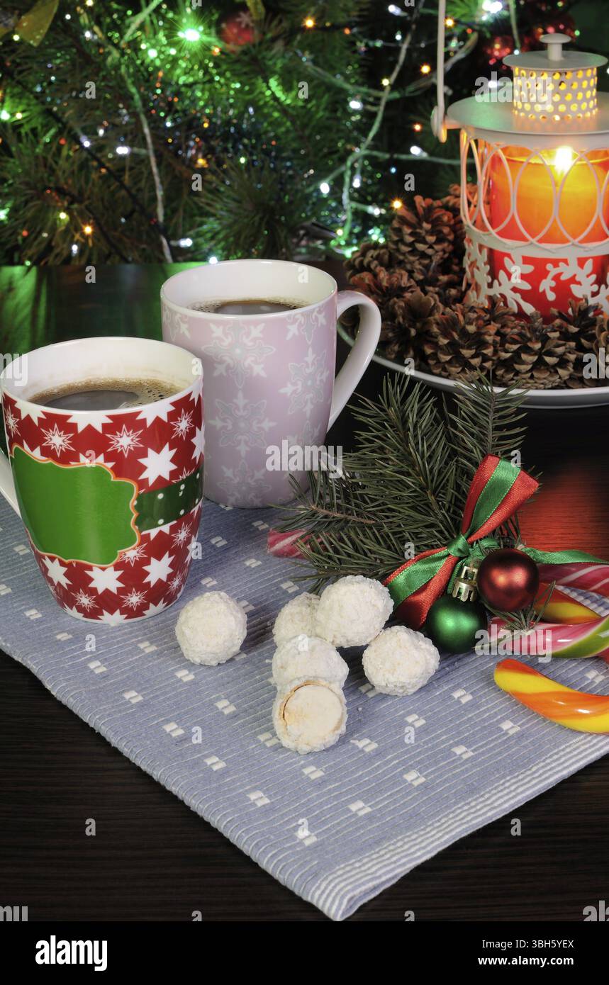 Crispy wafer balls with cream filling in coconut flakes Stock Photo - Alamy