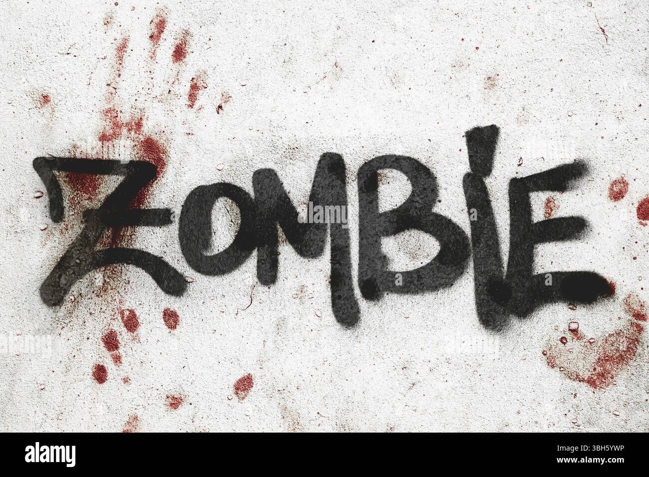 Bloody handprints on grungy wall with word ZOMBIE. For Halloween theme ...