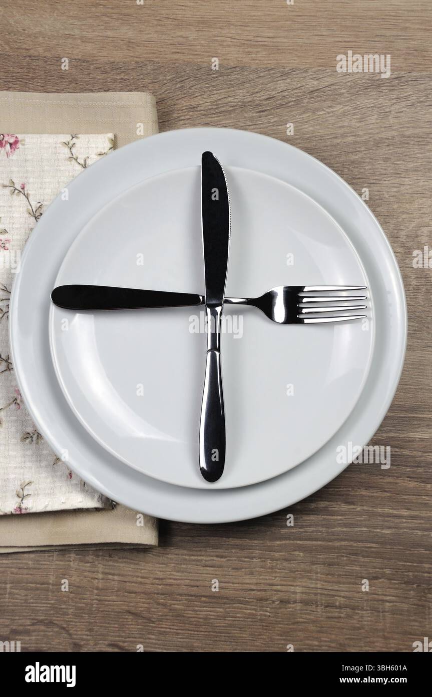 Dining etiquette - I still eat, ready for second plate. Fork and knife ...