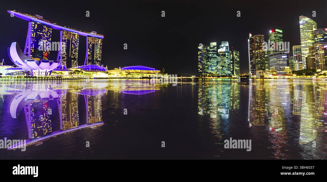 Panorama of Singapore buildings and skyscrapers of downtown reflected ...