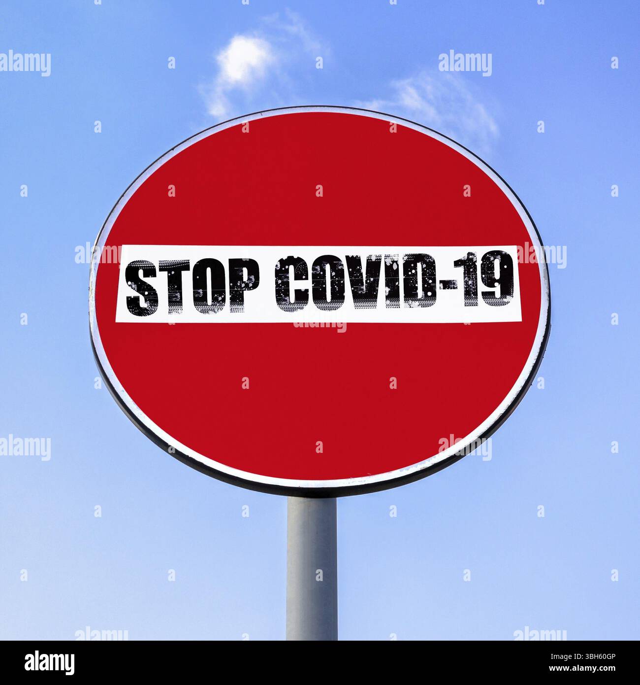 No access denied road sign with message STOP COVID-19 on sky background ...