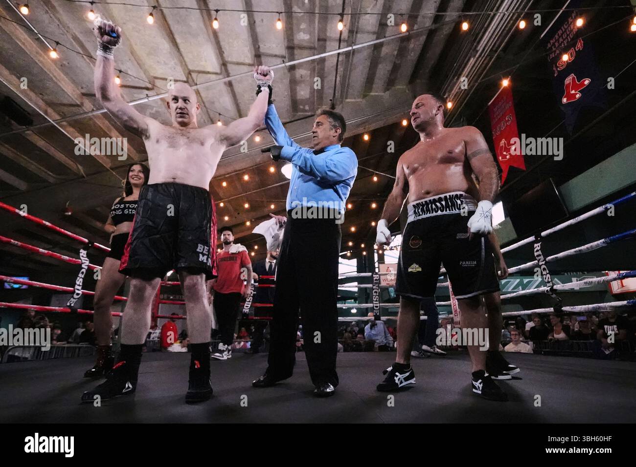 Bobby Laing, left, of Braintree, Mass., raises his fists after ...