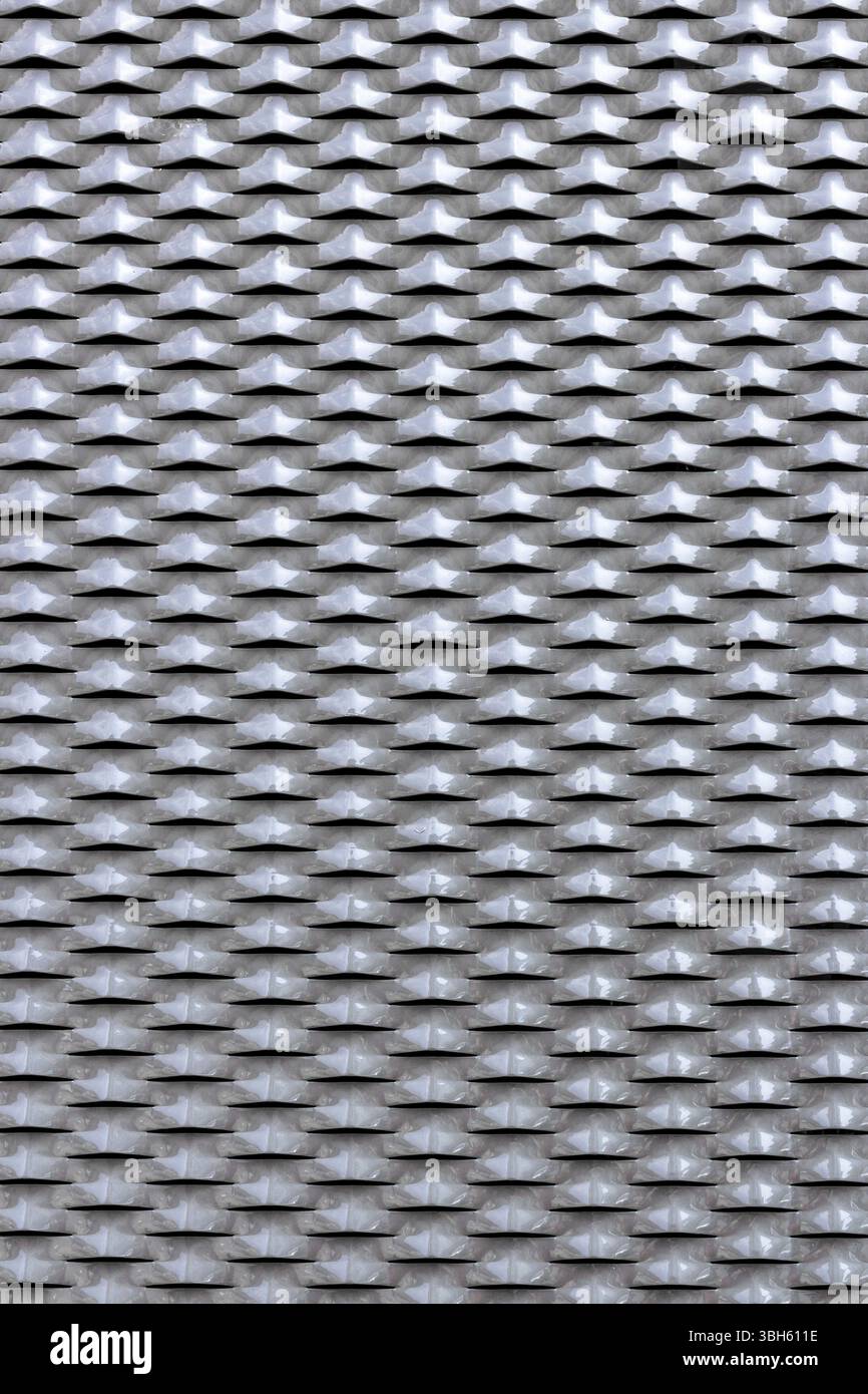 Perforated panel, painted with gloss gray tint Stock Photo - Alamy