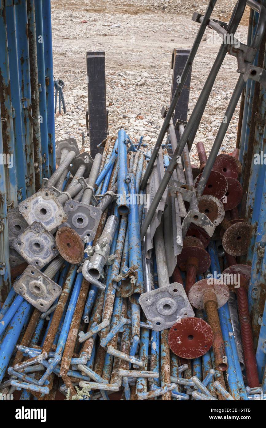 Blue rusty scaffolding, arranged in a row Stock Photo - Alamy