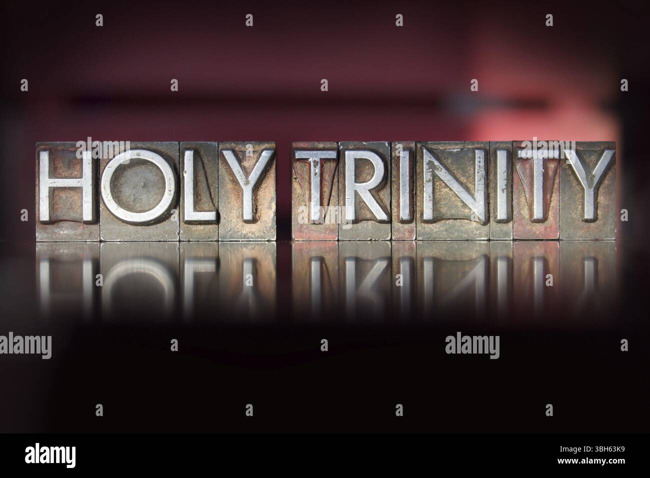 The word Holy Trinity written in vintage letterpress type Stock Photo ...