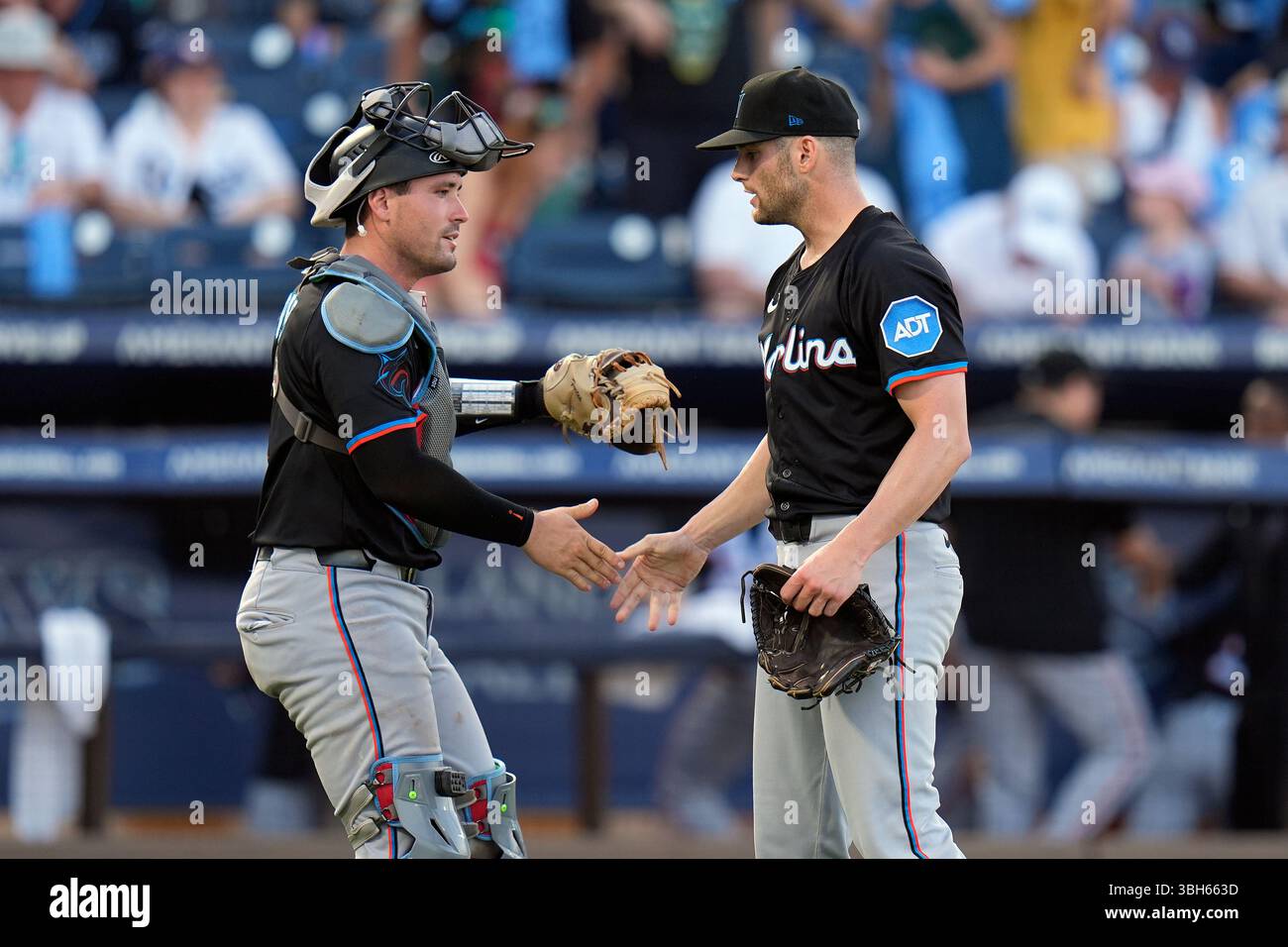 Miami Marlins pitcher Cade Gibson, right, celebrates with catcher Nick ...