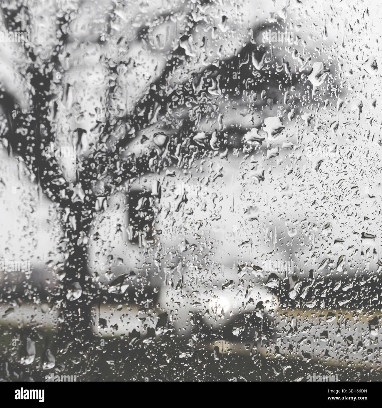 Bad weather driving on a way. Poor view caused by heavy rain and spray ...