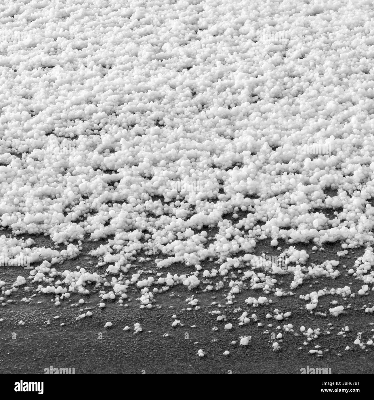 Hail on the ground Black and White Stock Photos & Images - Alamy