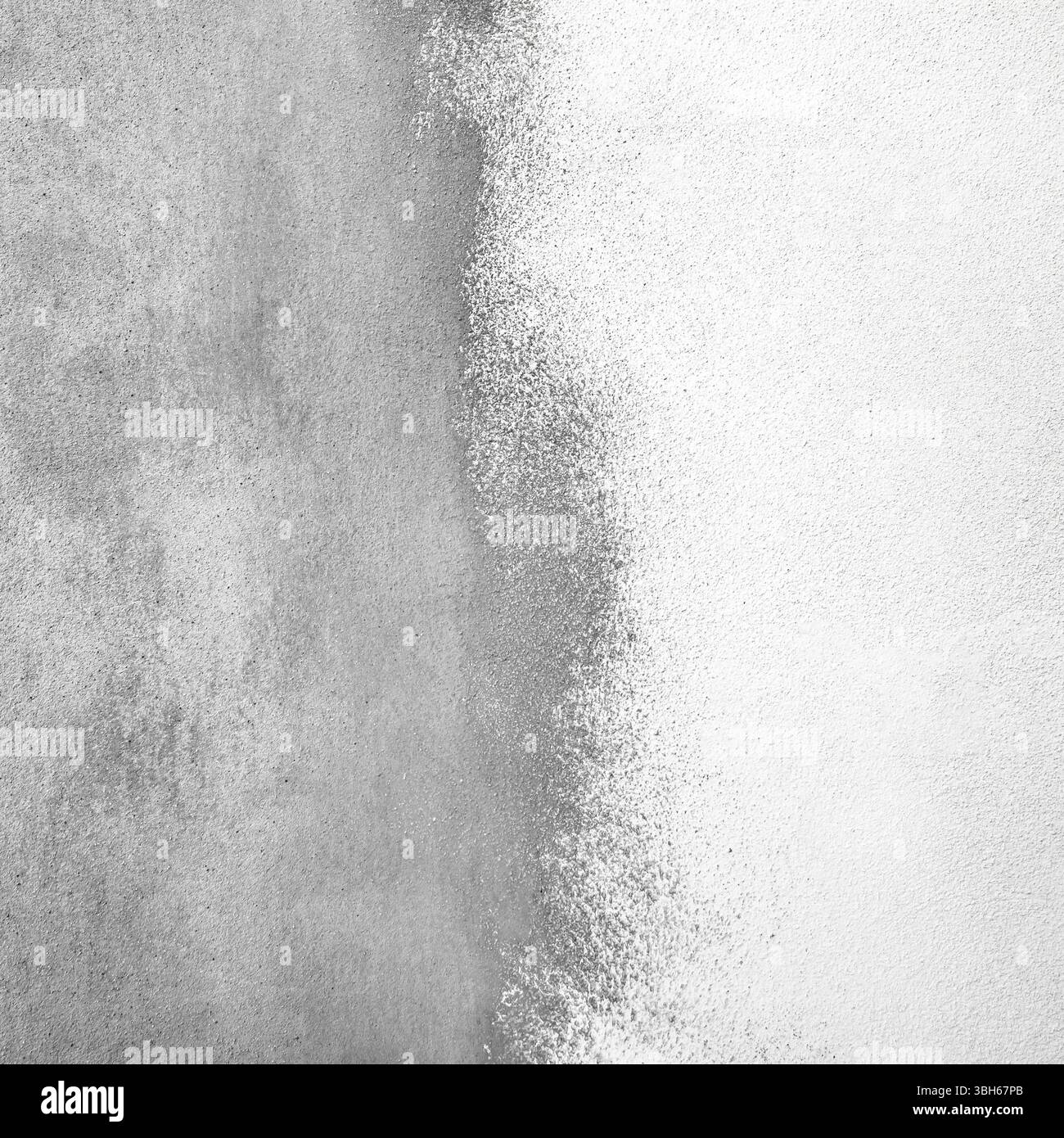 Decorative plaster surface. Grained abstract wall texture divided by ...