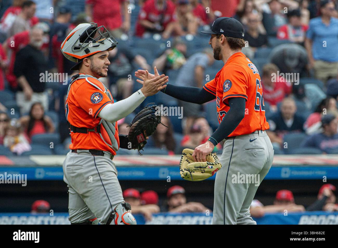 Houston Astros' Yainer Diaz, left, congratulates Bennett Sousa, right ...