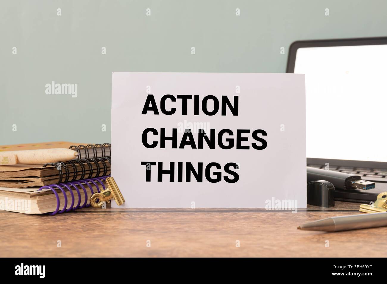 Action changes things phrase written with a typewriter Stock Photo - Alamy
