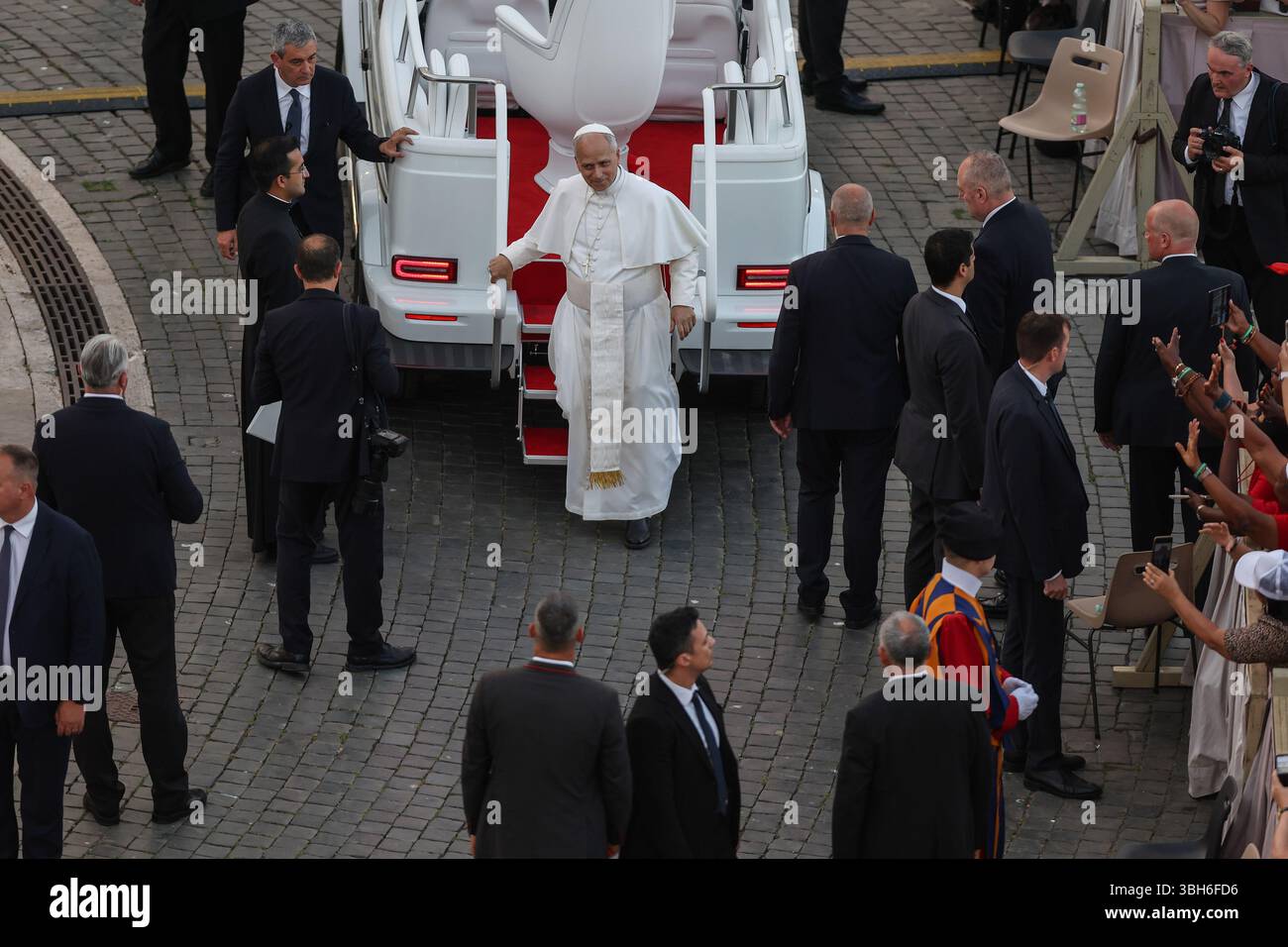 Pope Leo XIV, Robert Francis Prevost, gets out of the popemobile. Pope ...