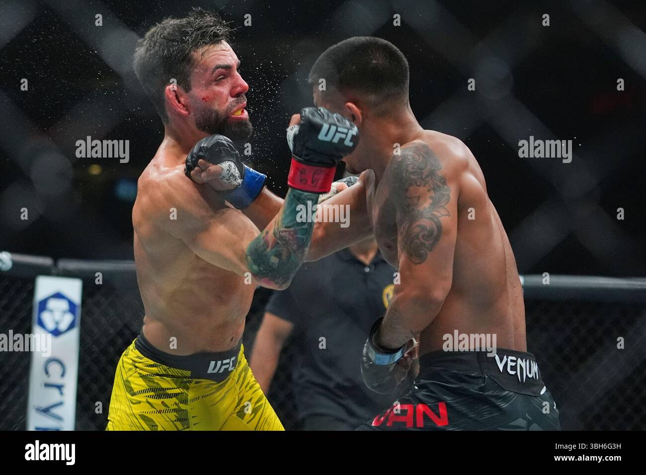 Myanmar's Joshua Van, right, punches Brazil's Bruno Silva during the ...