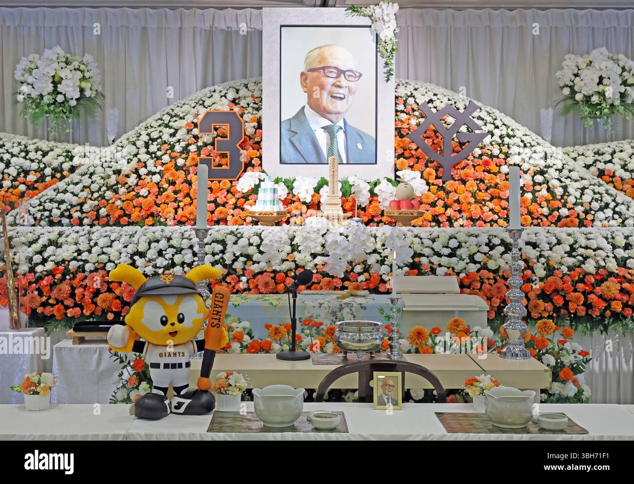 A portrait of Shigeo Nagashima is displayed on the altar at funeral ...