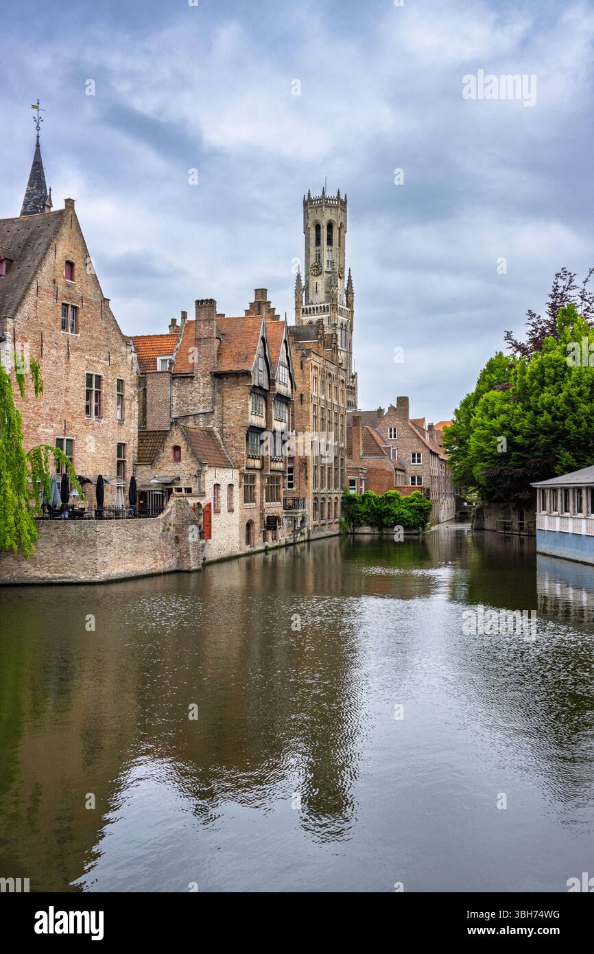 The famous medieval Belfry of Bruges rising above the picturesque ...