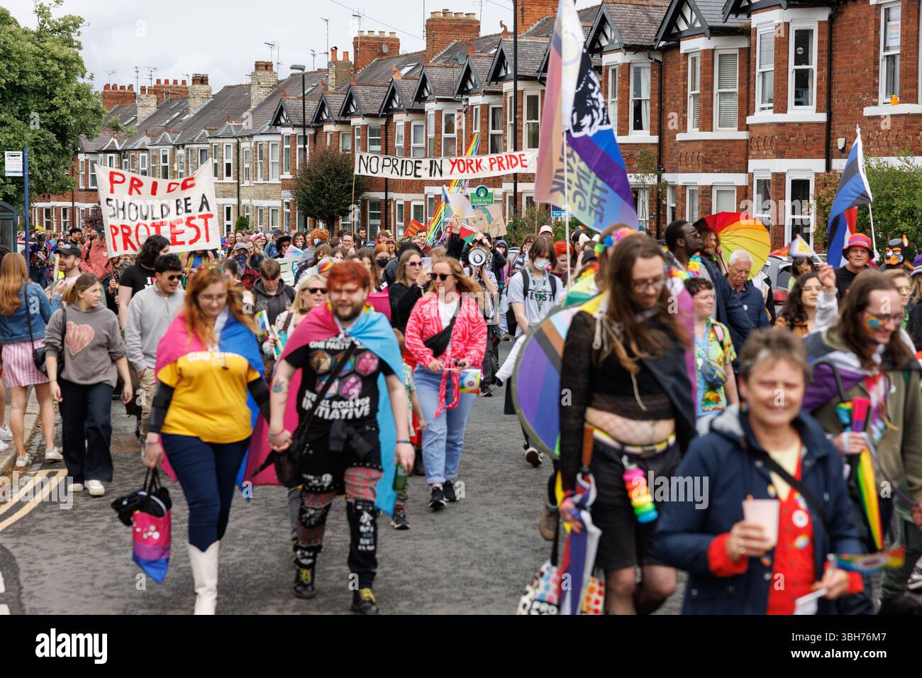 York, UK. 7 June, 2025. A parade at York Pride 2025 passes through York ...
