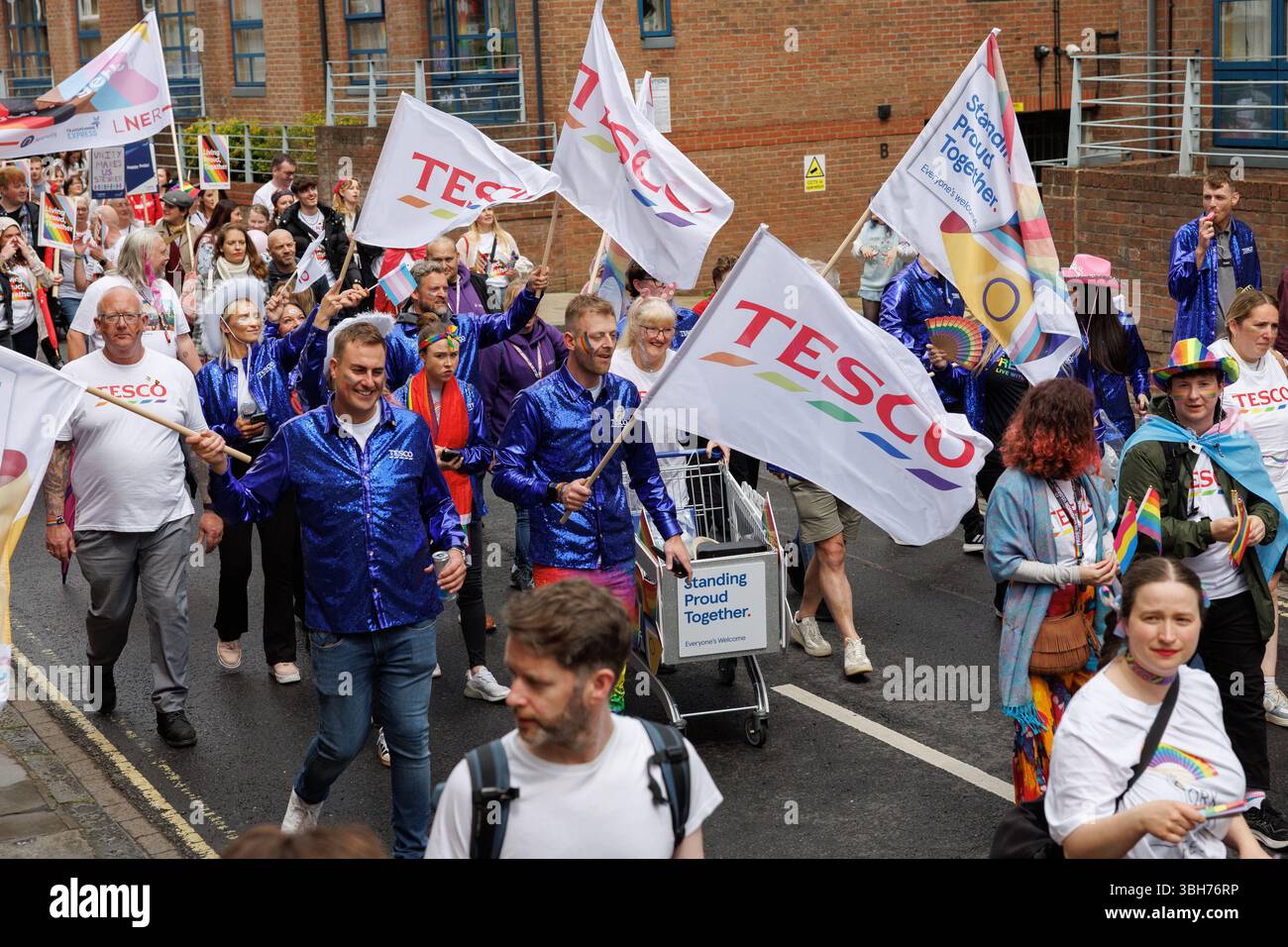 York, UK. 7 June, 2025. Tesco staff marching in the parade at York ...