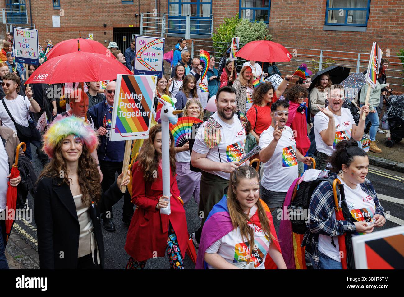 York, UK. 7 June, 2025. LNER staff marching in the parade at York Pride ...