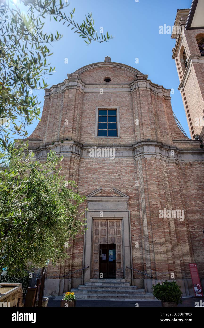 The church has a beautiful baroque brick-clad facade, with a portal ...