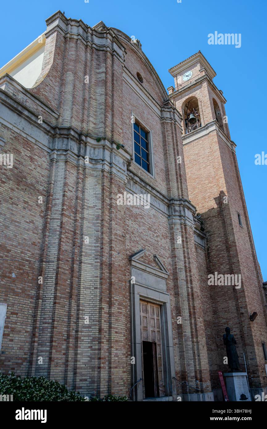 The church has a beautiful baroque brick-clad facade, with a portal ...